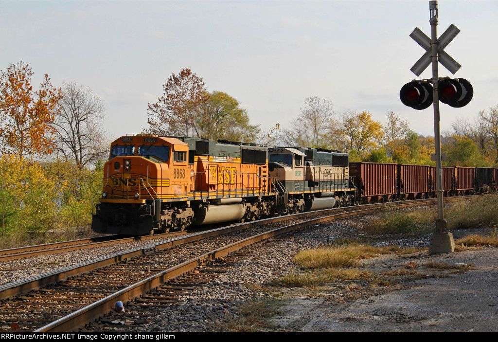 BNSF 9542 works dpu on this Sb ore train.